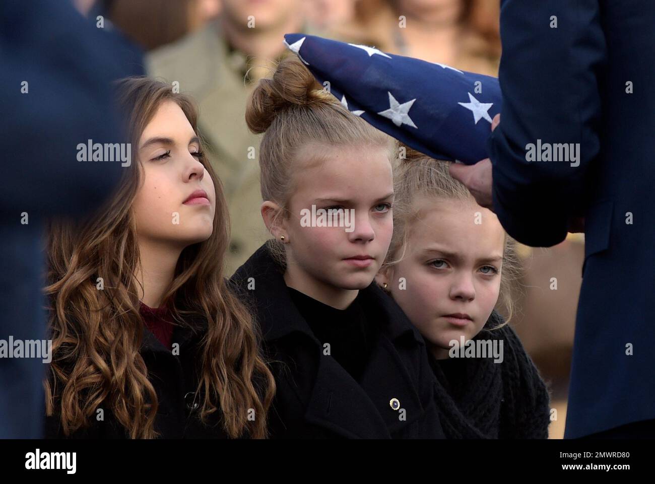 Flags are presented to the children of U.S. Air Force Maj. Troy Lee ...