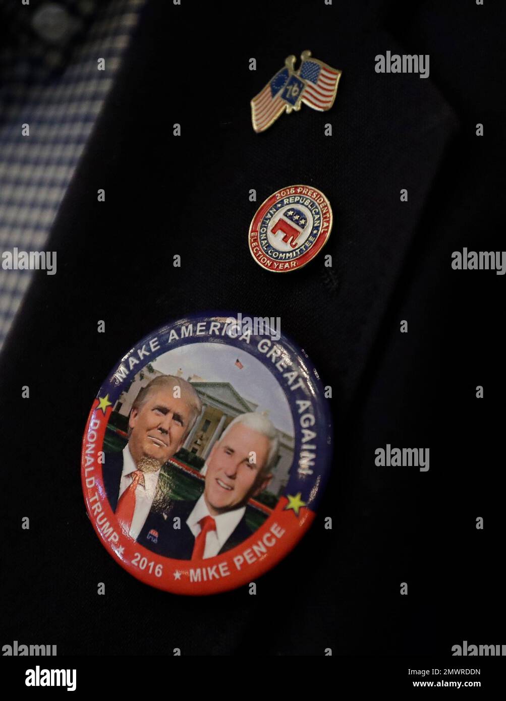 Electoral College elector John Haggard wears a Trump/Pence button ...