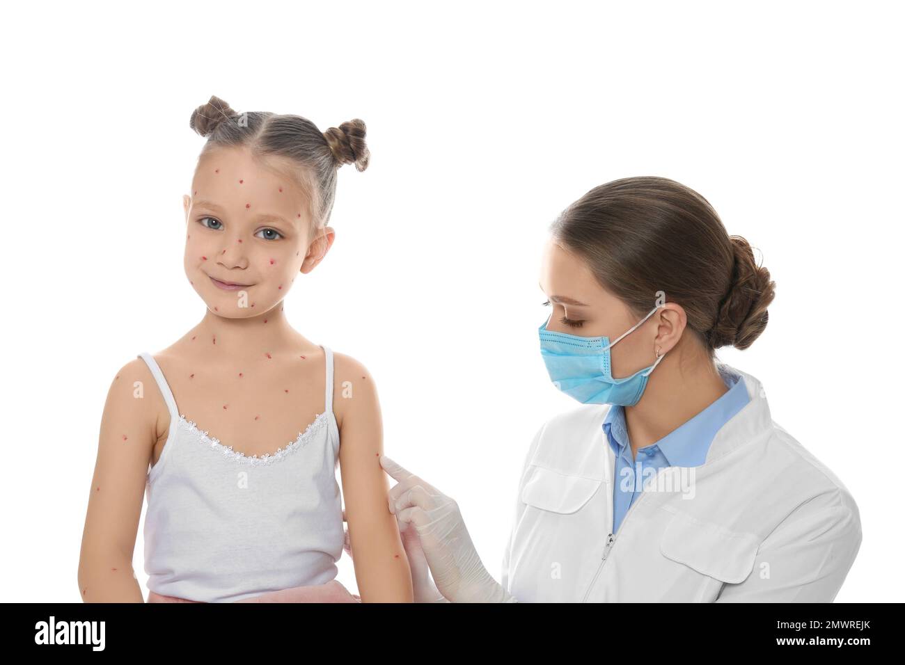 Doctor examining little girl with chickenpox on white background ...