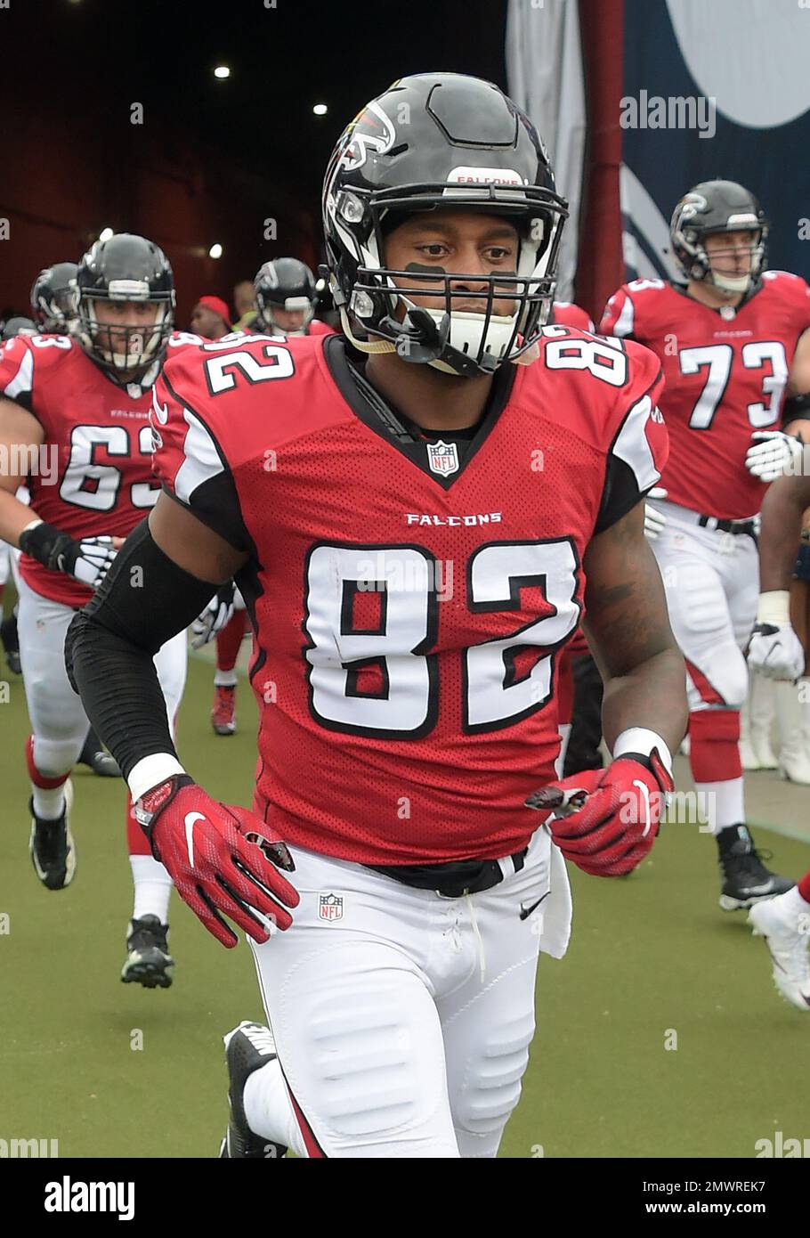 Atlanta Falcons tight end Joshua Perkins (82) heads towards the field ...