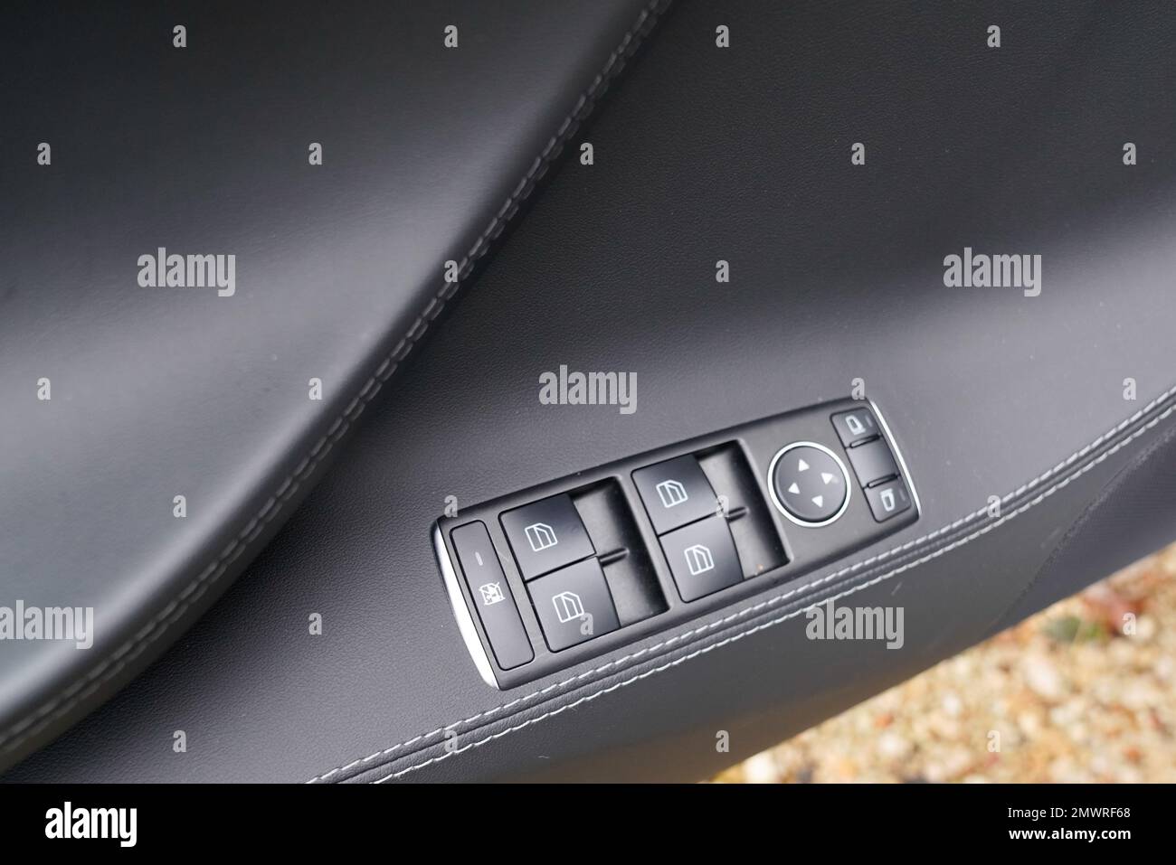 door control panel in a new modern car electric window button Stock ...