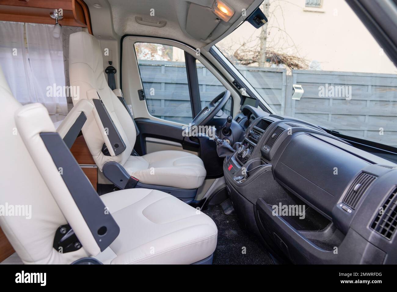 Camper van Dining Room front vanlife steering wheel Stock Photo - Alamy