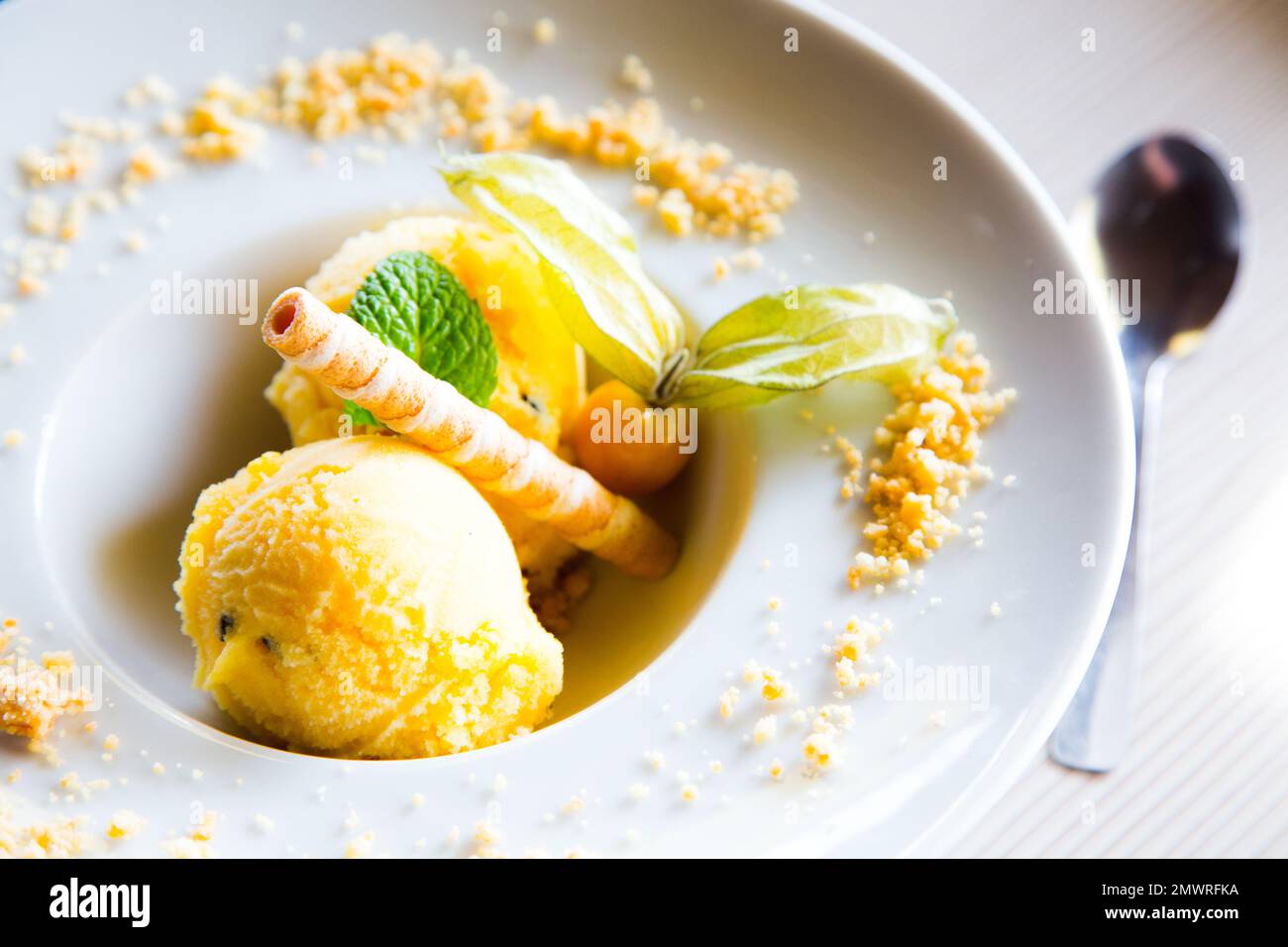 Organic mango fruit ice cream Stock Photo - Alamy