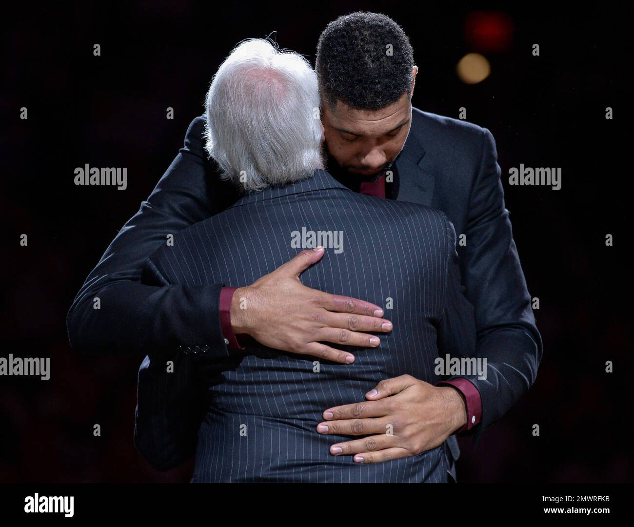 San Antonio Spurs legend Tim Duncan, right, hugs Spurs head coach Gregg ...