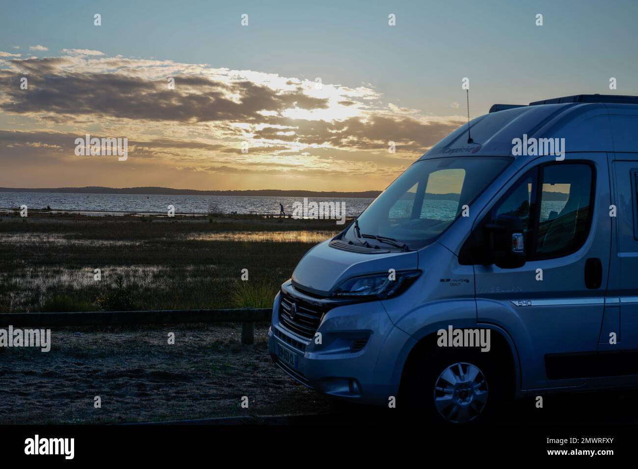 Beautiful view with camper van rv during sunrise in summer in van life ...