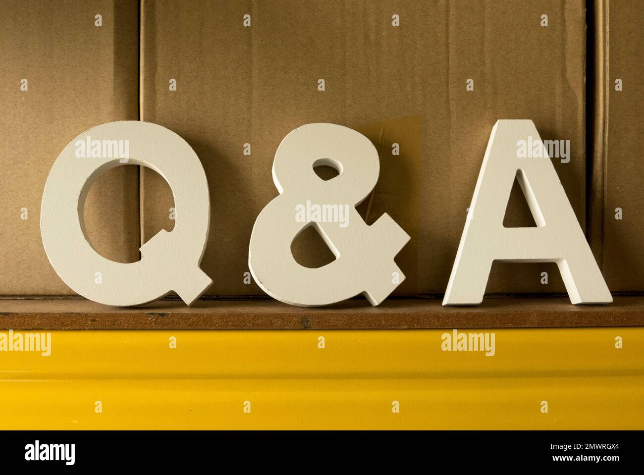 Question and answers concept. Wooden alphabet of letter q and a Stock ...