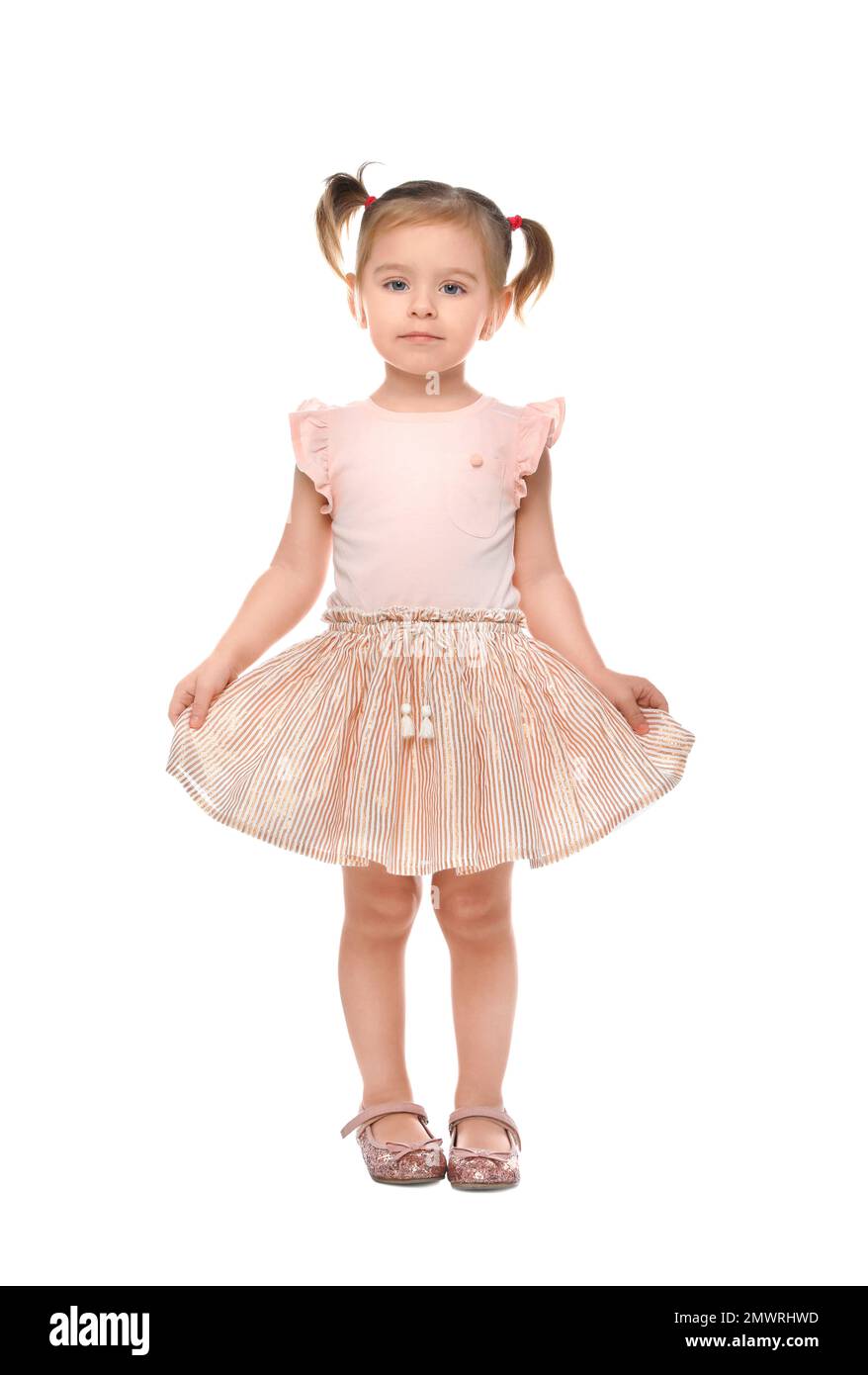 Little girl in cute clothes on white background Stock Photo - Alamy