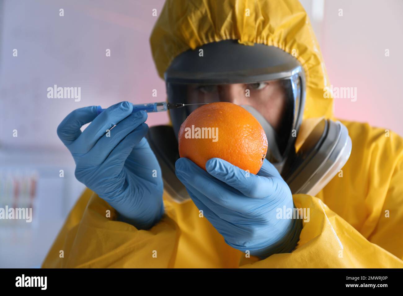 Syringe injecting orange fruit hi-res stock photography and images - Alamy