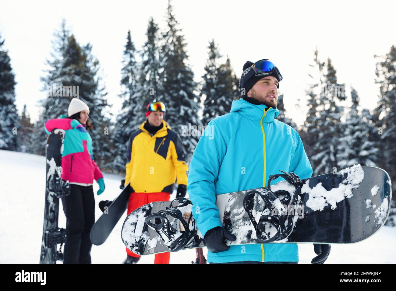Female snowboarder in mountains hi-res stock photography and images - Alamy