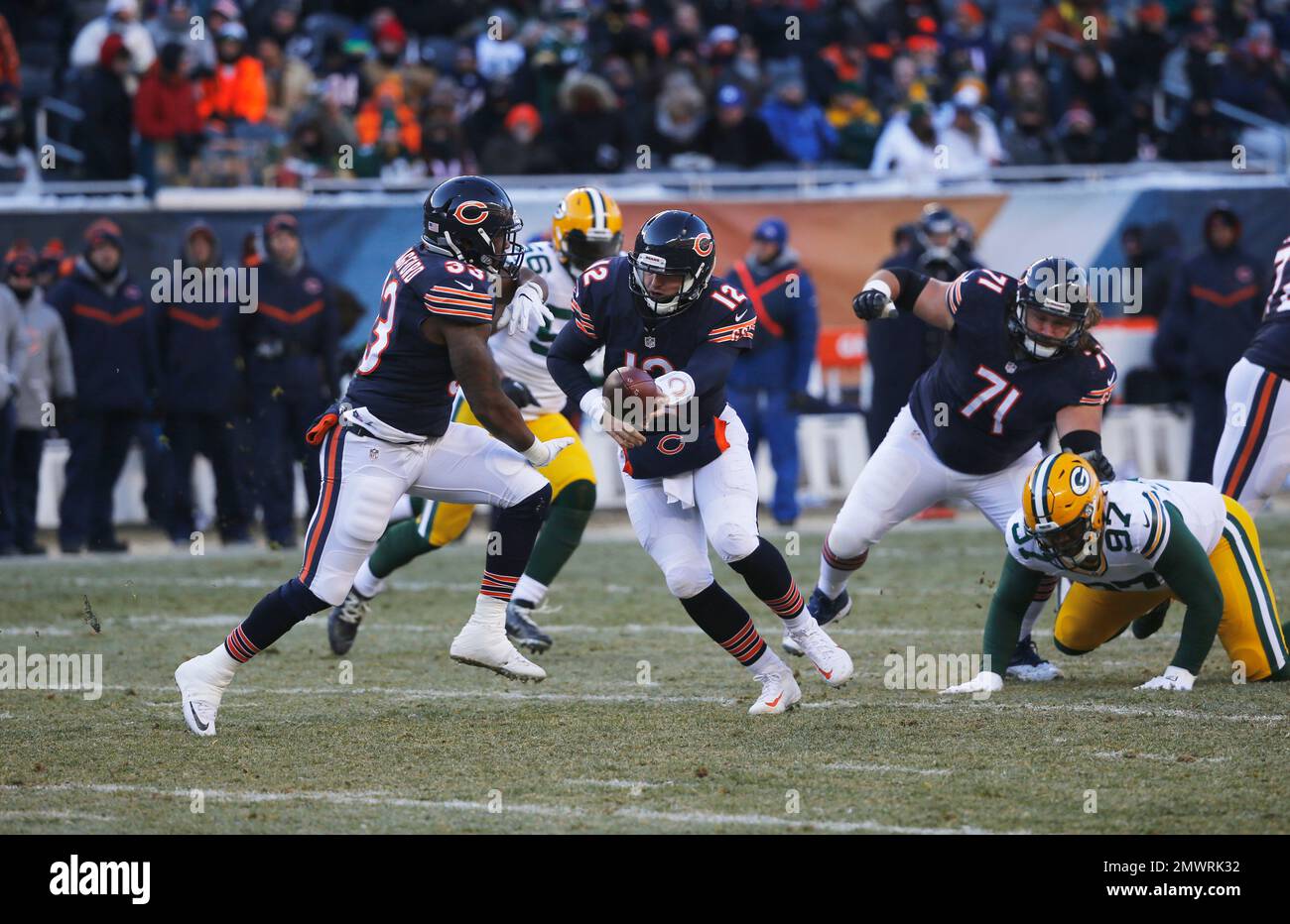 Chicago Bears quarterback Matt Barkley (12) hands off to running back ...