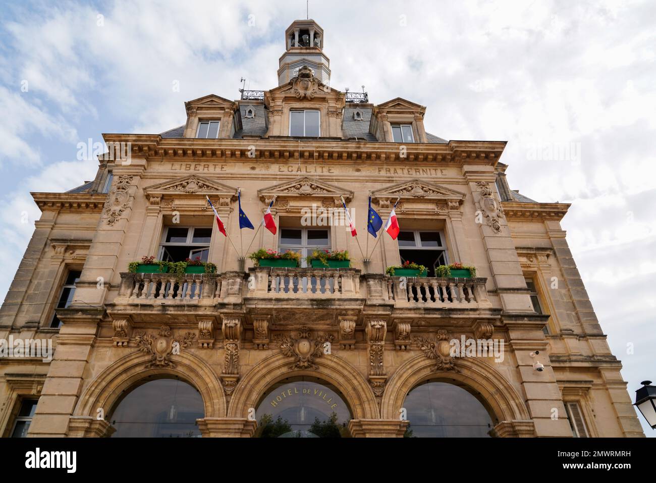 French tricolor and europa flag on mairie text building mean city hall ...