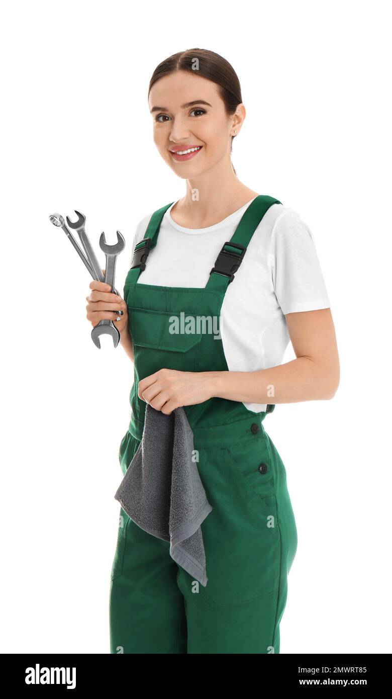 Portrait of professional auto mechanic with wrenches and rag on white ...