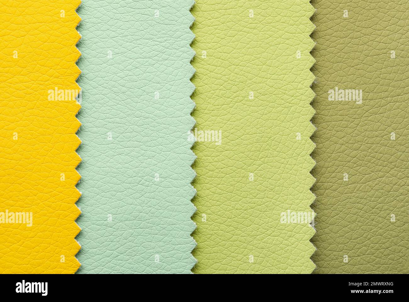 Leather samples of different colors for design as background, closeup ...