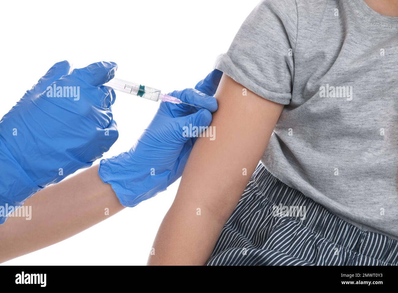 Little girl receiving chickenpox vaccination on white background ...