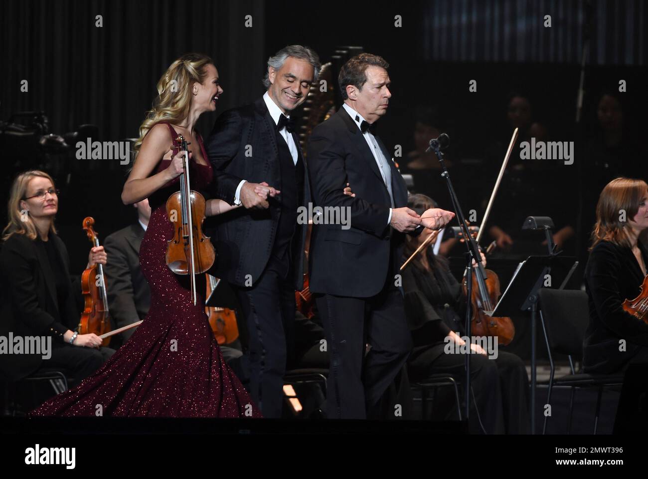 Singer Andrea Bocelli, left, performs with conductor Eugene Kohn and ...