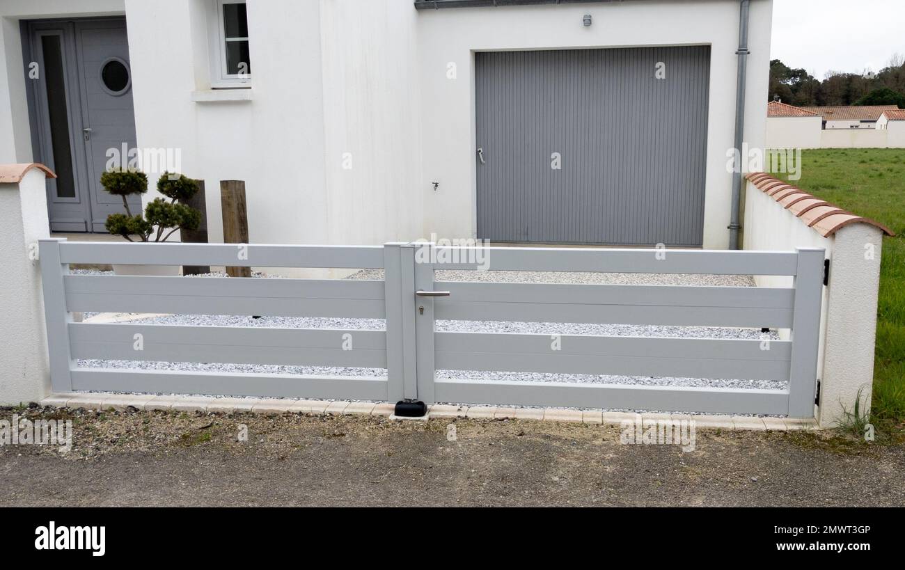 low modern steel metal gate white of home suburb street access house ...