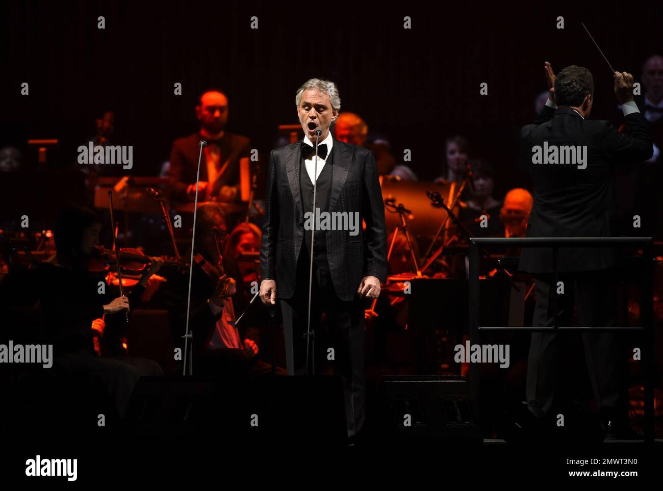 Singer Andrea Bocelli performs with conductor Eugene Kohn and The ...