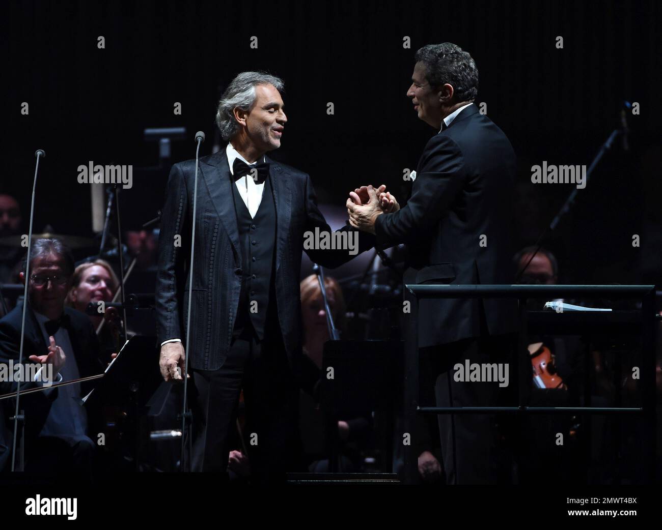 Singer Andrea Bocelli performs with conductor Eugene Kohn and The ...