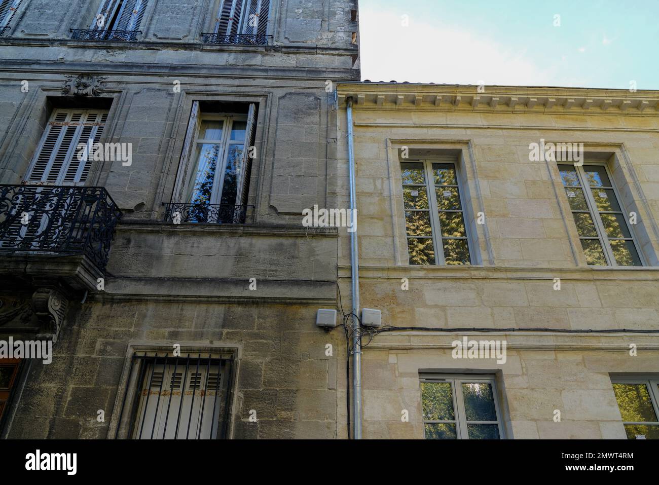 clean wash cleaning wall house building facade and a dirty one before ...