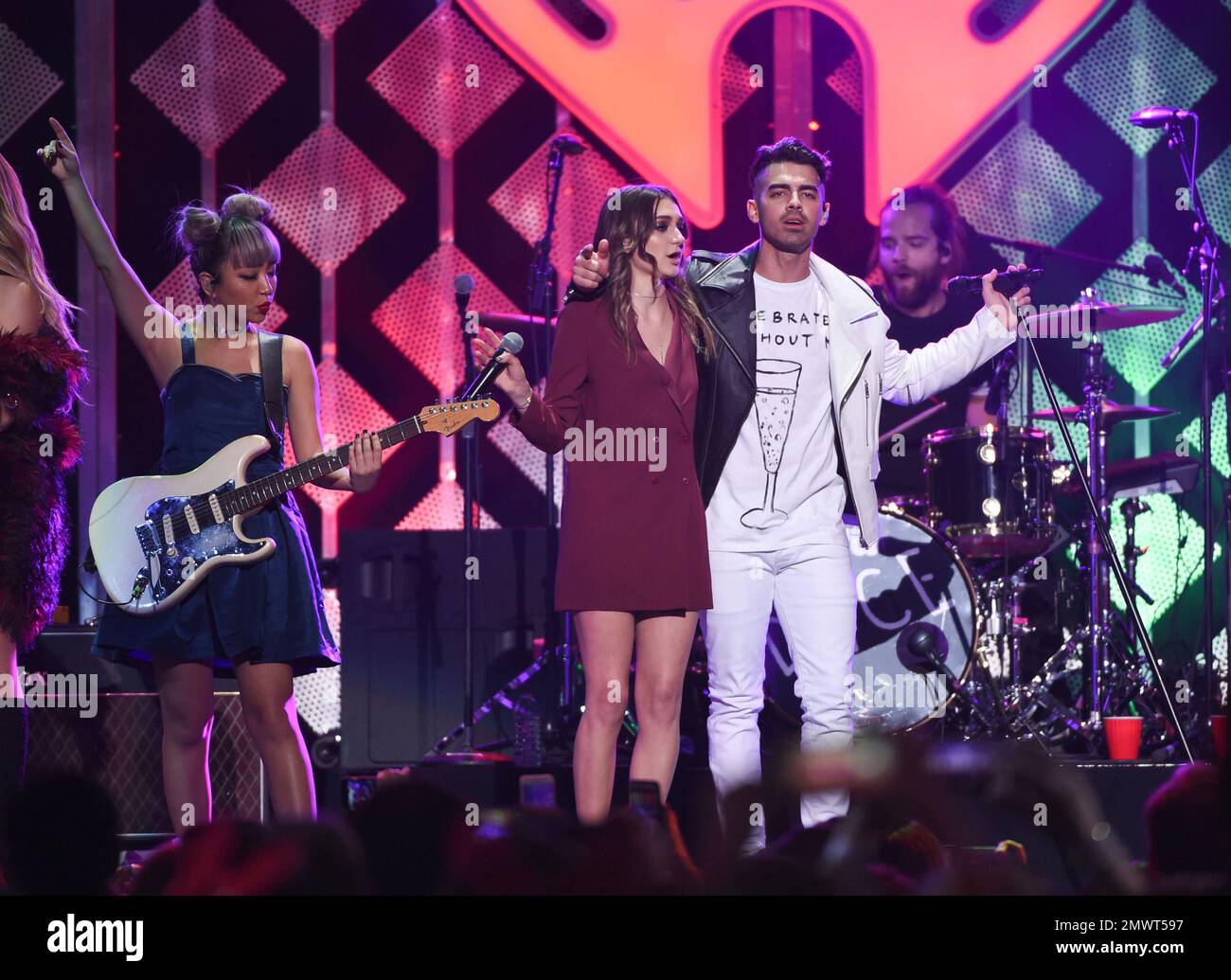 JinJoo Lee, left, Daya and Joe Jonas perform together at Z100's ...