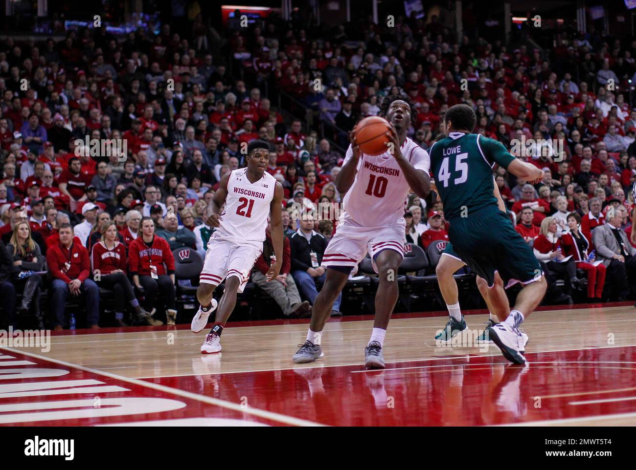 Wisconsin's Nigel Hayes (10) and Green Bay's Kenneth Lowe (45) during ...