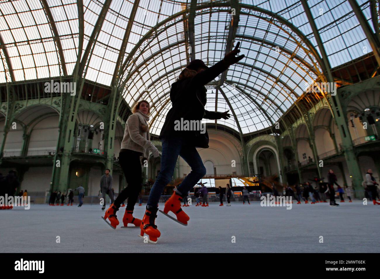 People ice skate at the Grand Palais in Paris, Thursday, Dec. 15, 2016 ...
