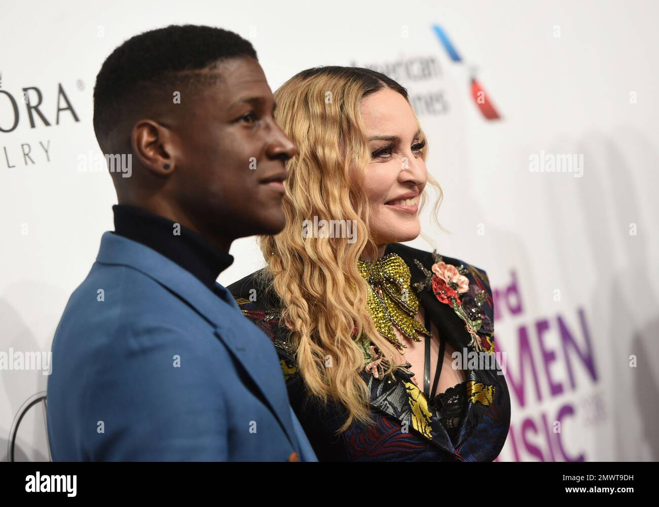 Singers Labrinth, left, and Madonna attend the 11th Annual Billboard ...
