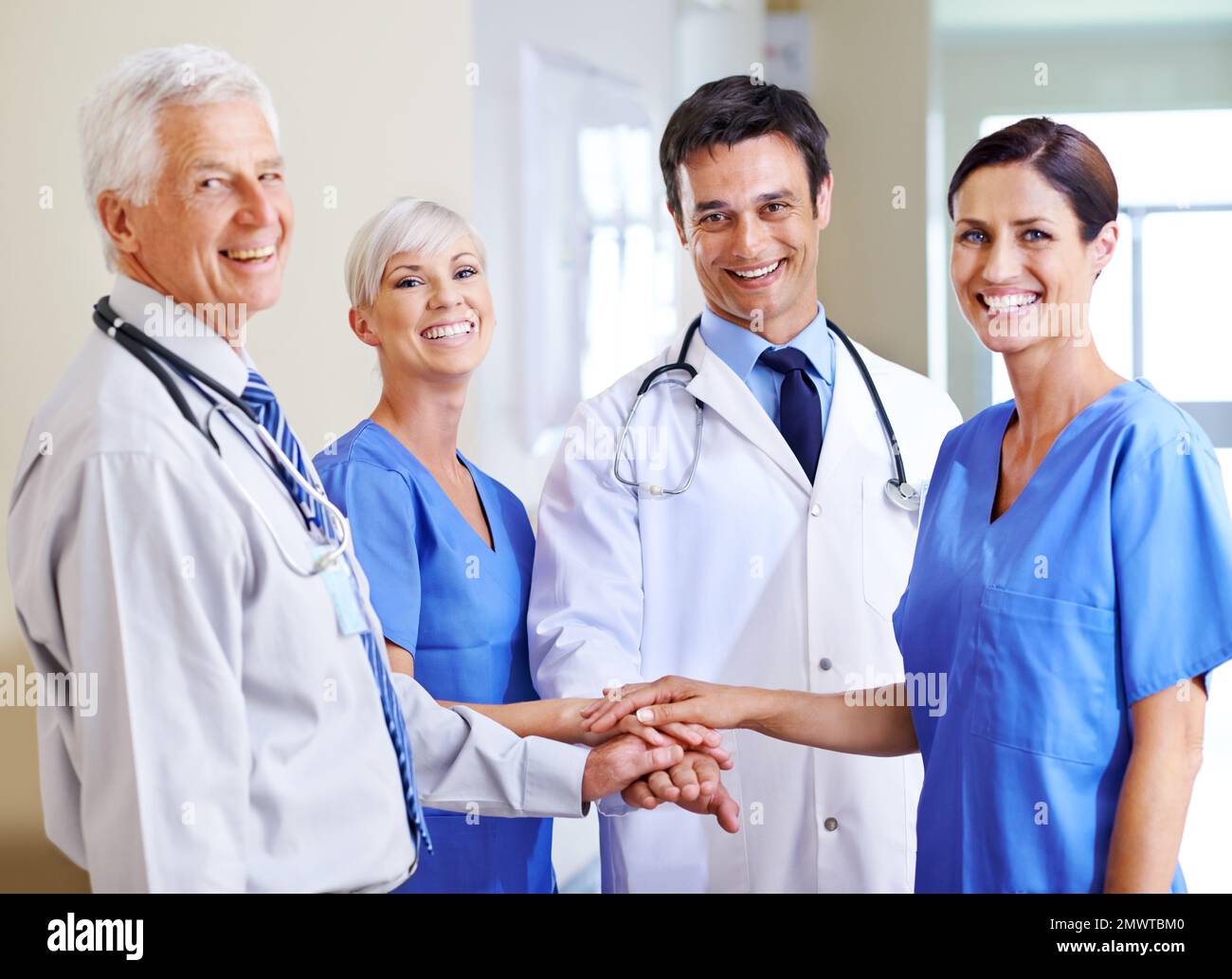 Their team is good medicine. Portrait of a smiling medical team ...