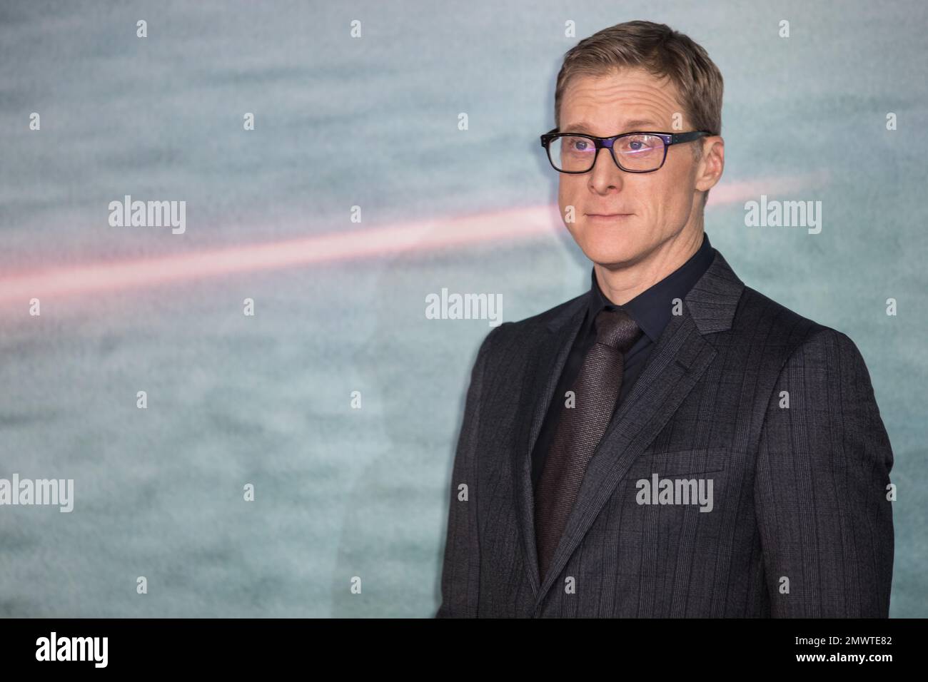 Actor Alan Tudyk poses for photographers upon arrival at the premiere ...