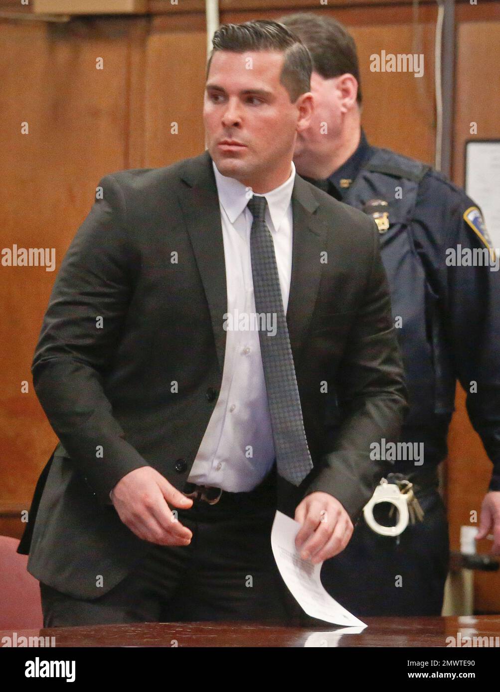 Lawrence Dilione, 28, of New Jersey, leaves after his hearing in ...