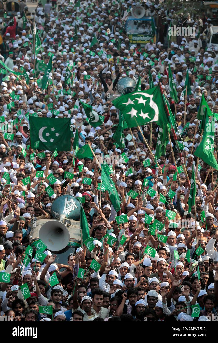 Bangladeshi Muslims march in a rally to celebrate the Eid-e-Milad-un ...