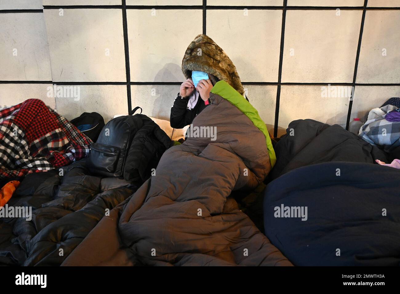 Recent migrants to the United States seeking asylum seen outside of the ...