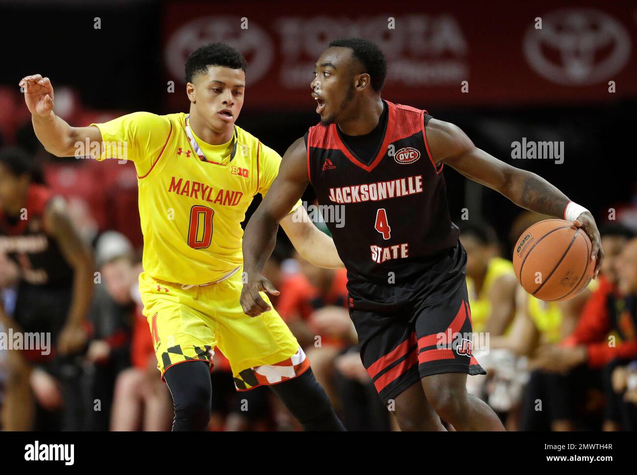 Jacksonville State guard Tyrik Edwards, right, tries to drive around ...