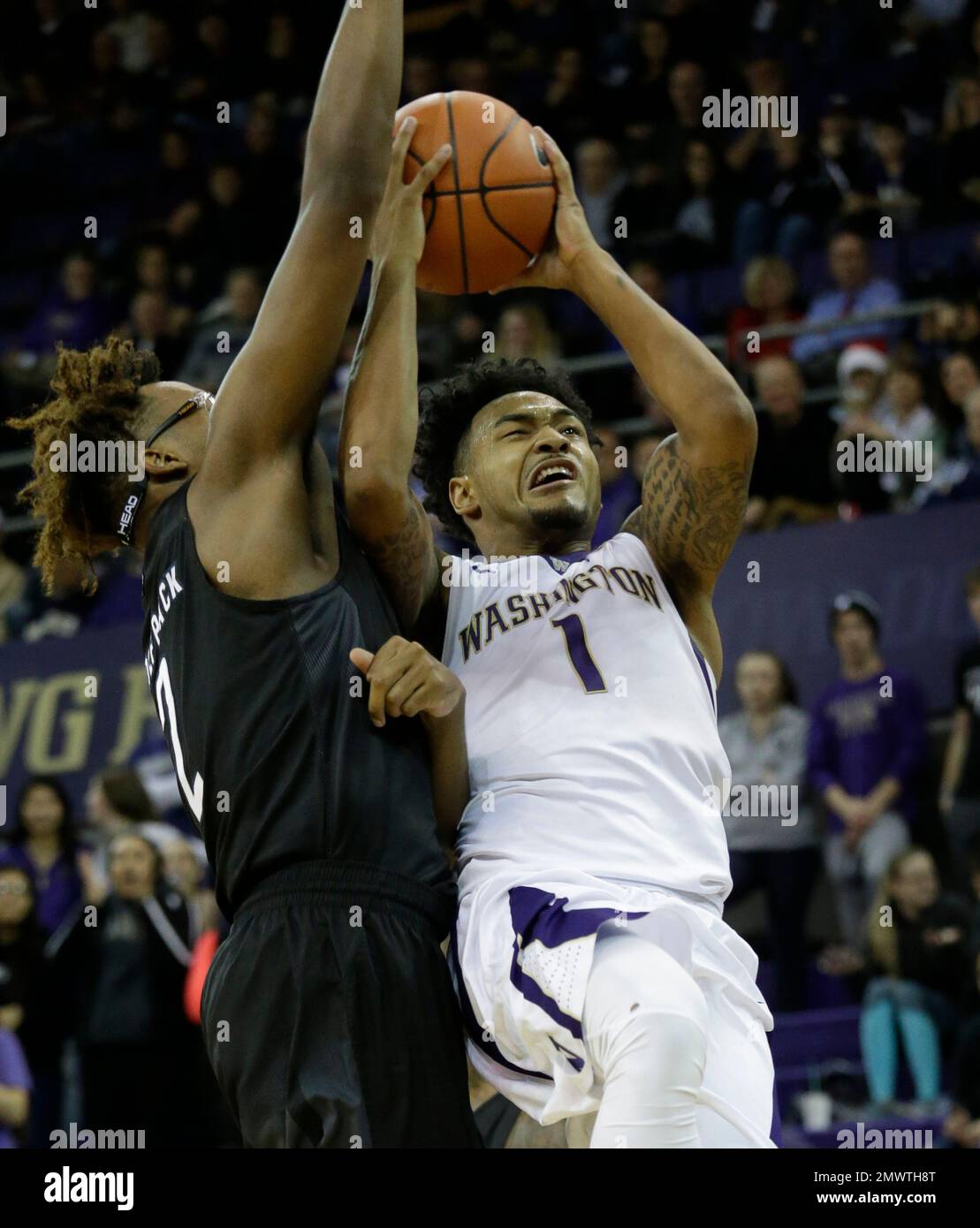 Washington's David Crisp in action against Nevada in an NCAA college ...