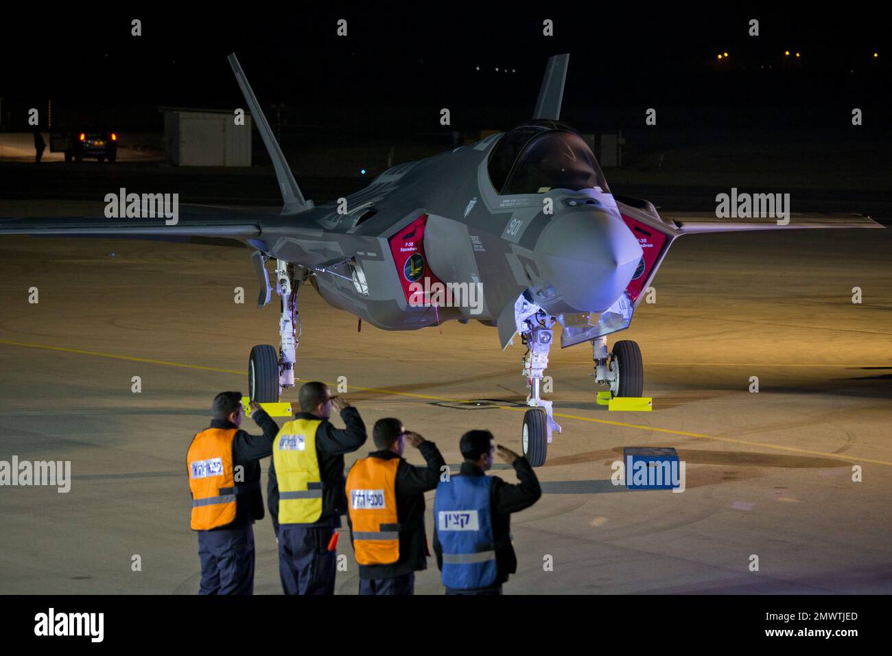 Israeli air force officers salute toward one of the first two next ...