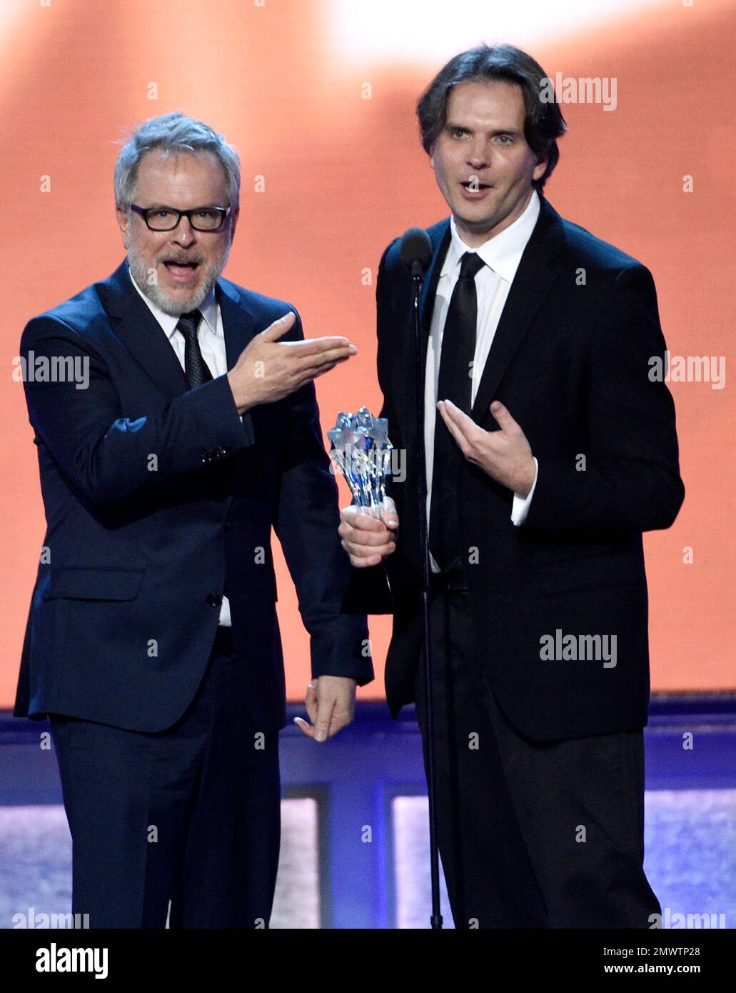 Rich Moore, left, and Byron Howard accept the award for best animated ...