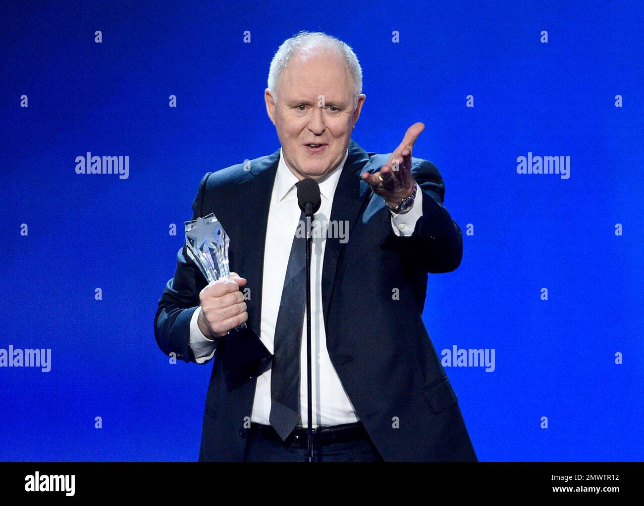 John Lithgow accepts the award for best supporting actor in a drama ...