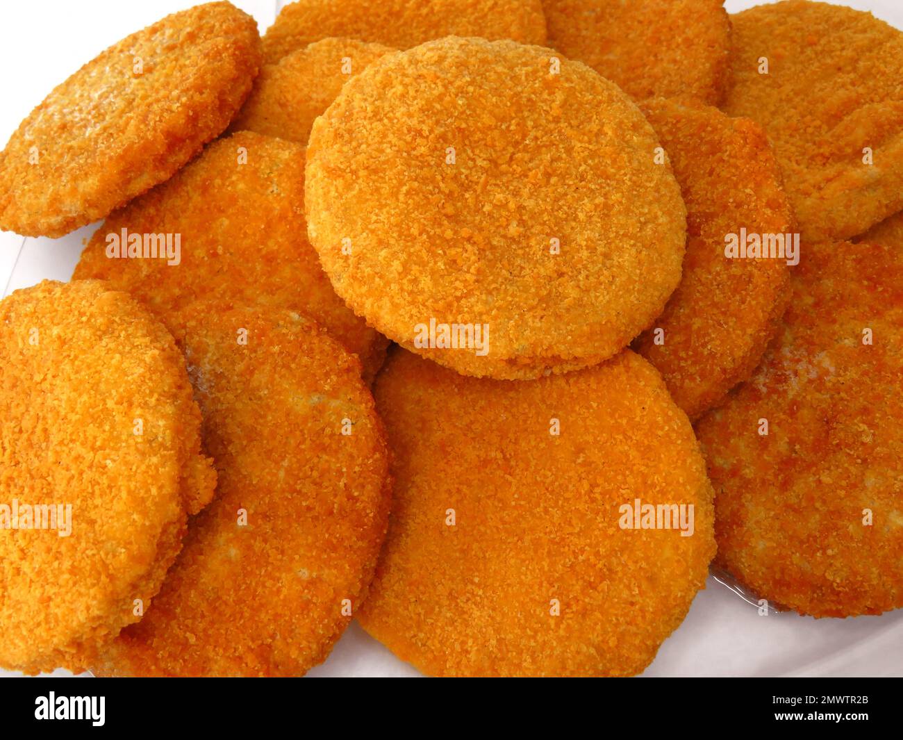 Clouseup background of fresh crispy fried fish cutlets Stock Photo - Alamy
