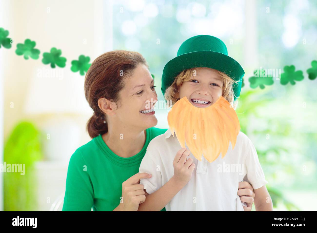 Mother and child on St Patricks day. Saint Patrick day celebration ...