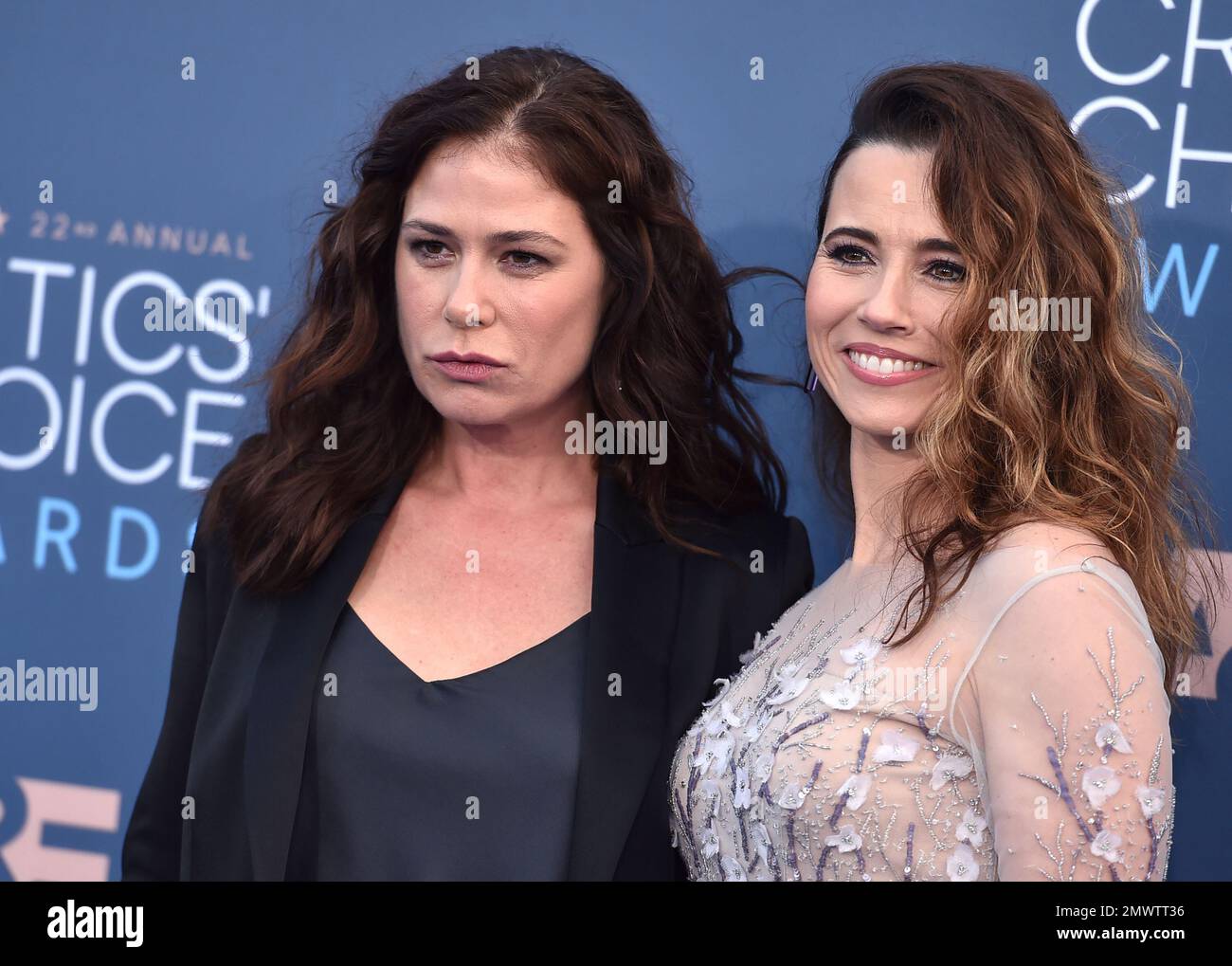 Maura Tierney, left, and Linda Cardellini arrive at the 22nd annual ...