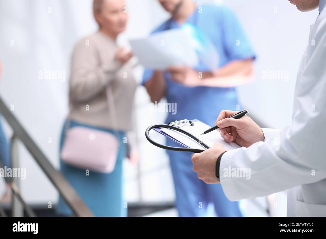 Doctor woman checking analysis results hi-res stock photography and ...