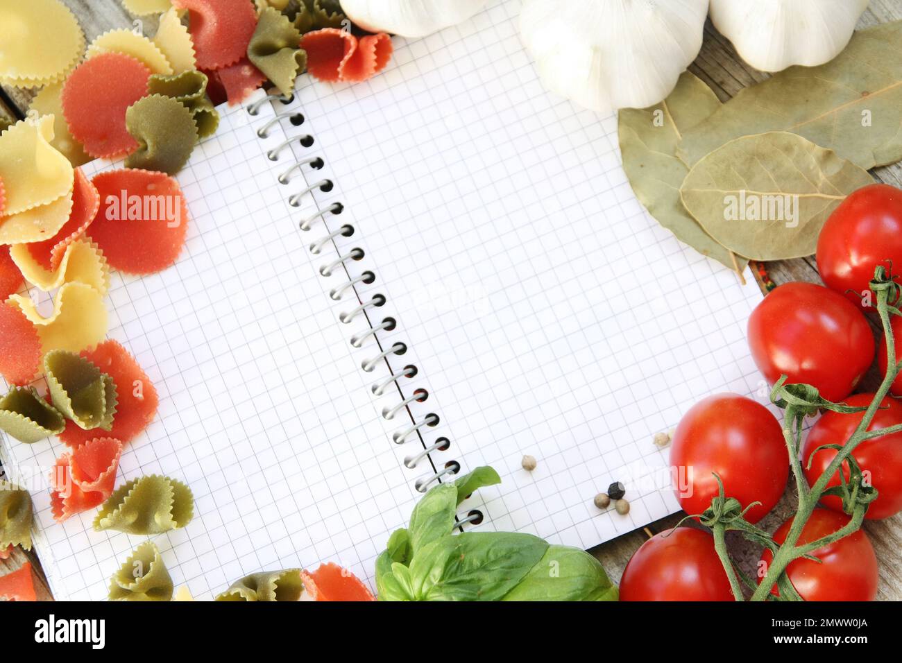 Note surrounded with pasta ingredient for menu or receipt text (manual ...