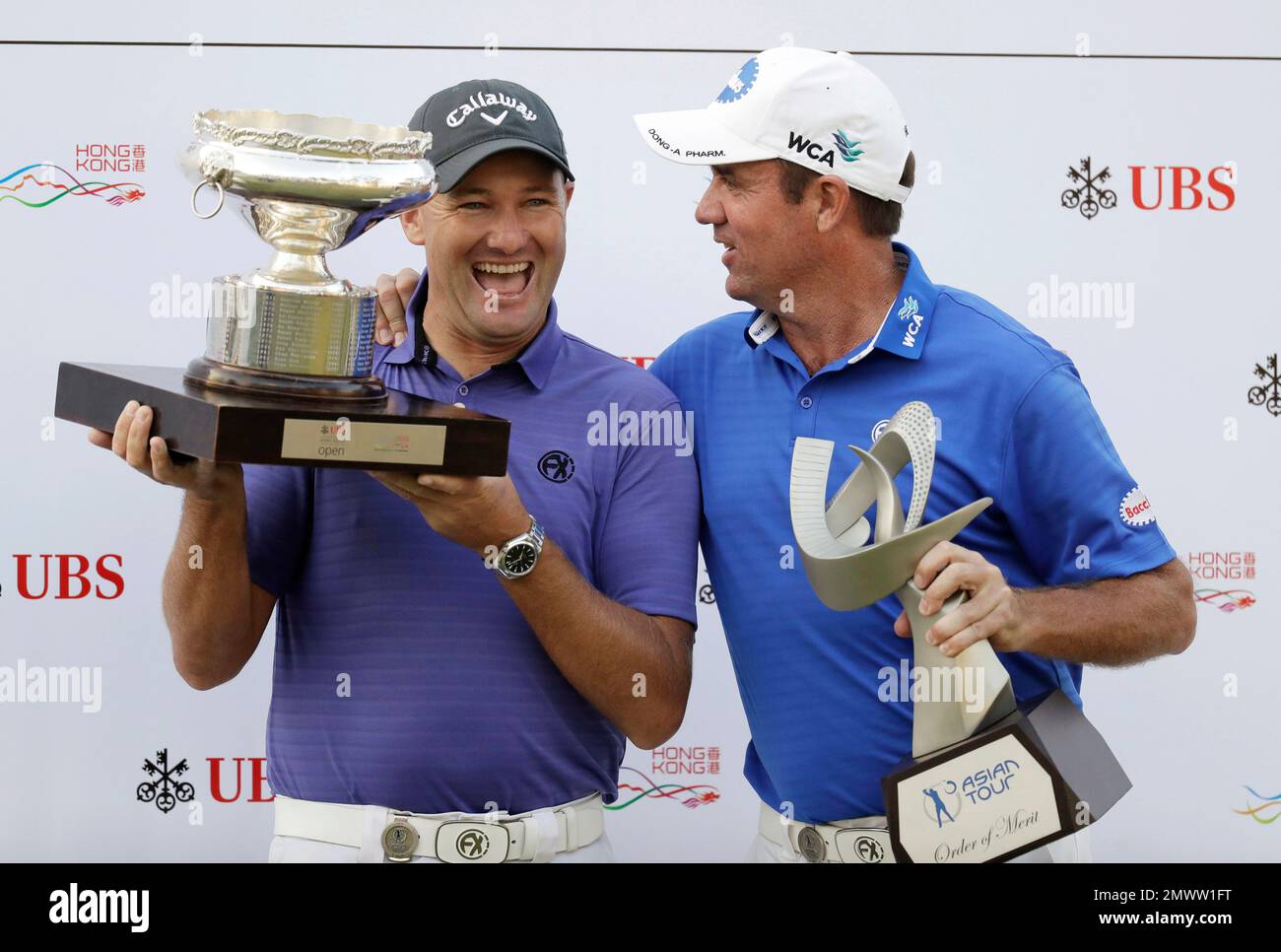 Hong Kong Open golf tournament winner Sam Brazel of Australia, left ...