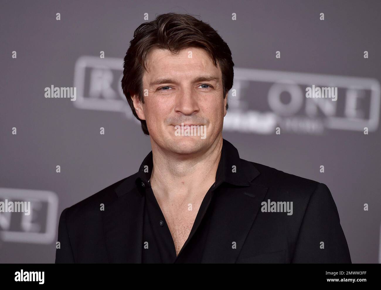 Nathan Fillion arrives at the world premiere of "Rogue One: A Star Wars ...