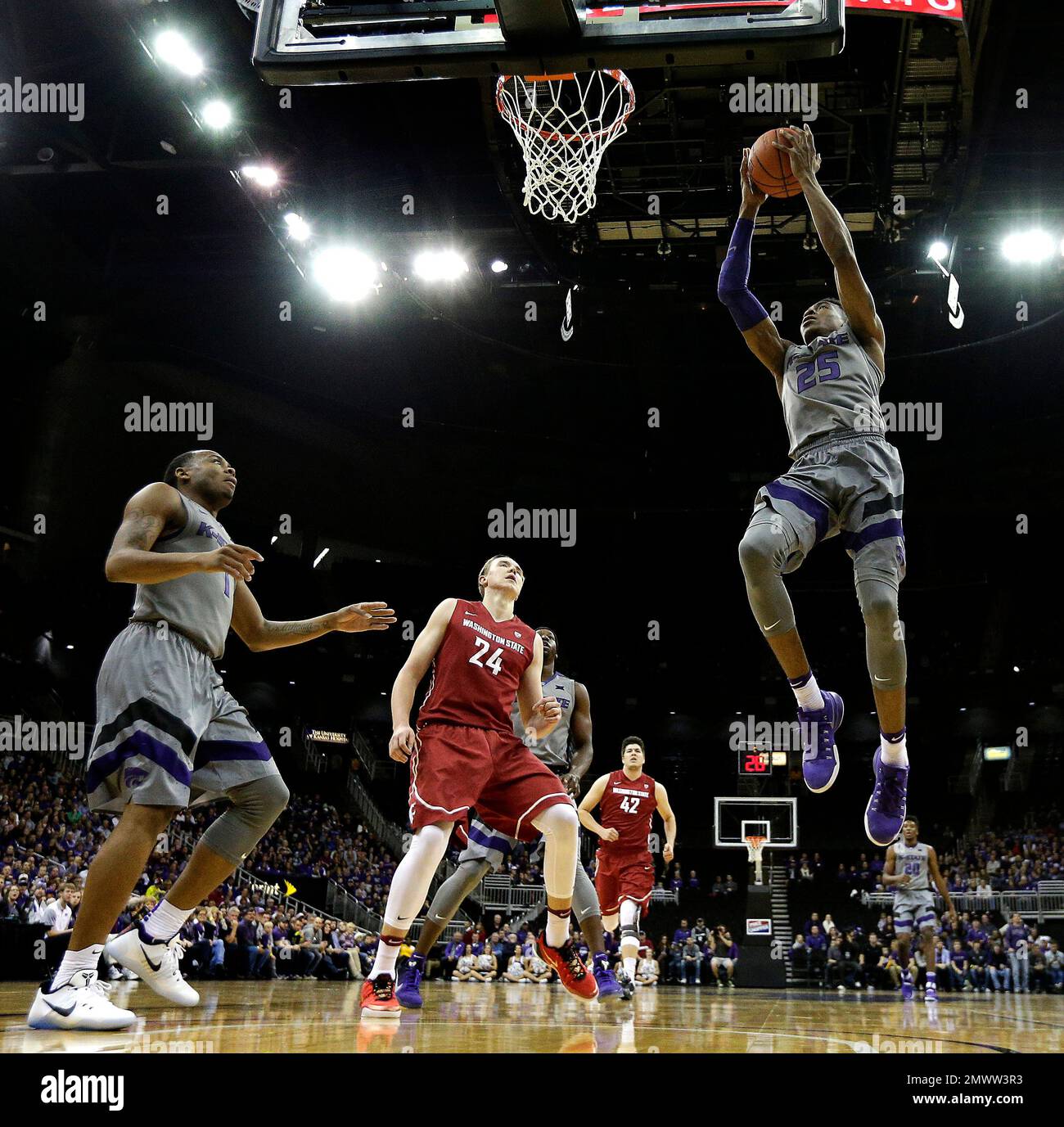 Kansas State's Wesley Iwundu (25) gets past Washington State's Josh ...