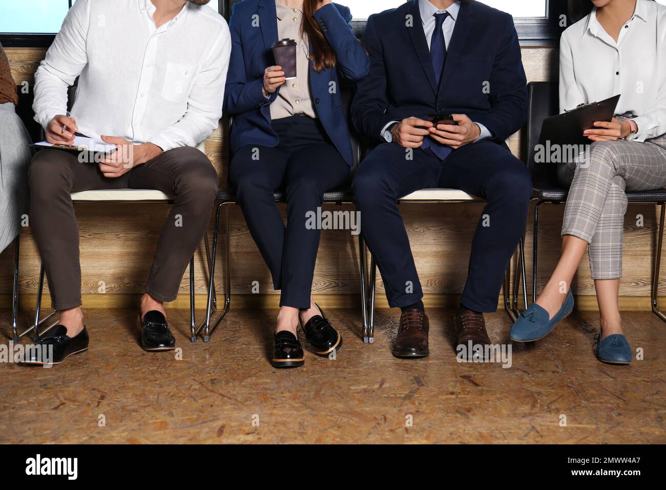 People waiting for job interview in office hall, closeup Stock Photo ...