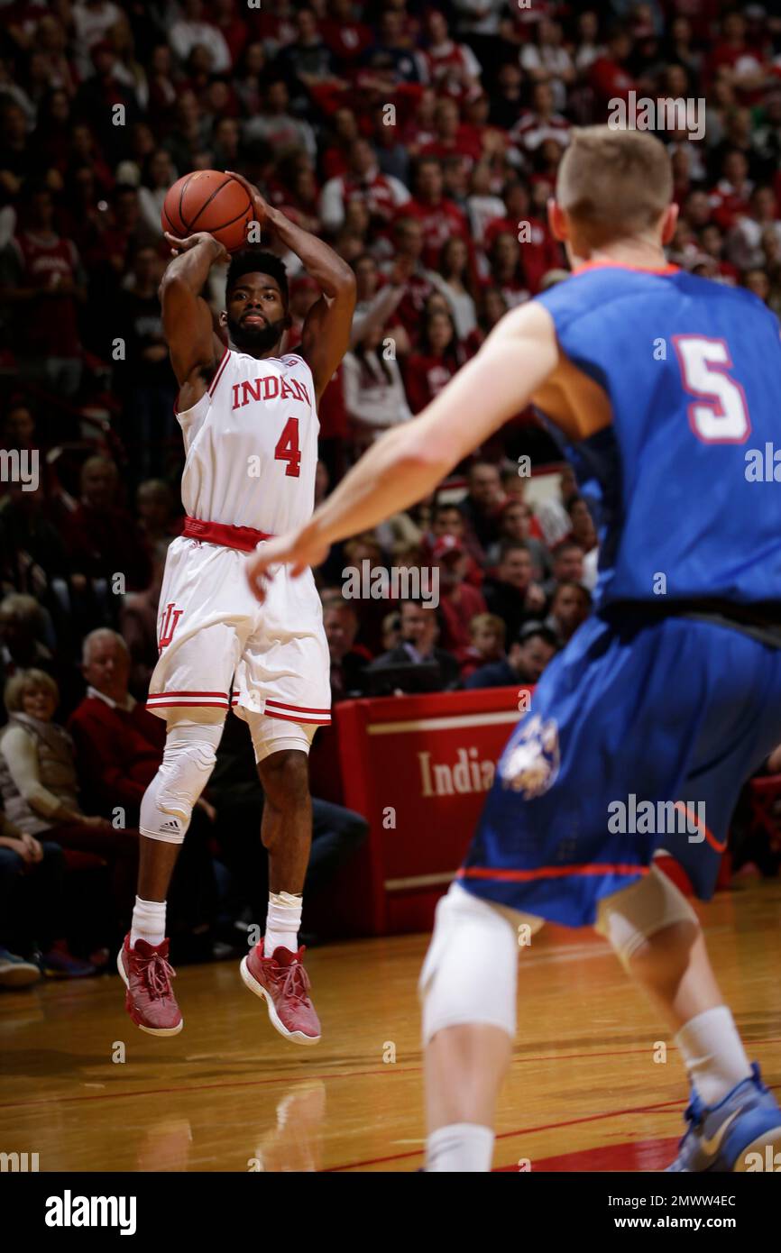 Indiana guard Robert Johnson (4) shoots in front of Houston Baptist ...
