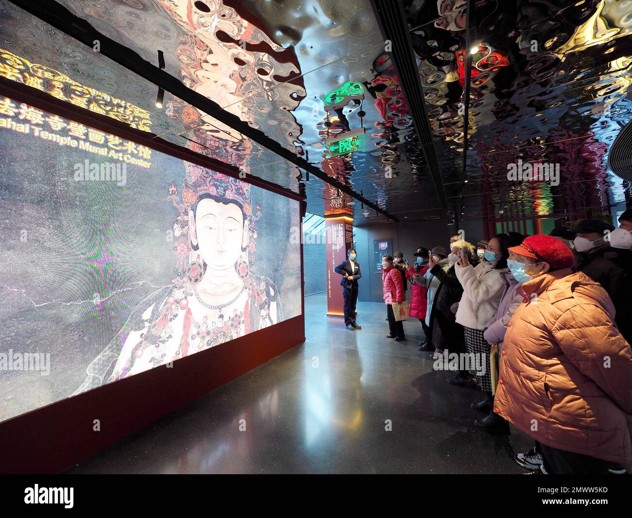 People visit Fahai Temple Mural Art Center in Shijingshan scenic spot ...