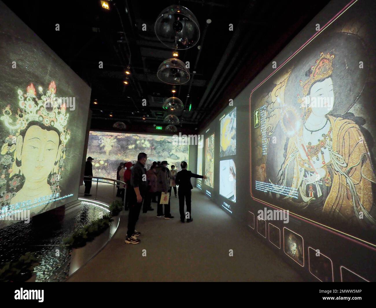 People visit Fahai Temple Mural Art Center in Shijingshan scenic spot ...