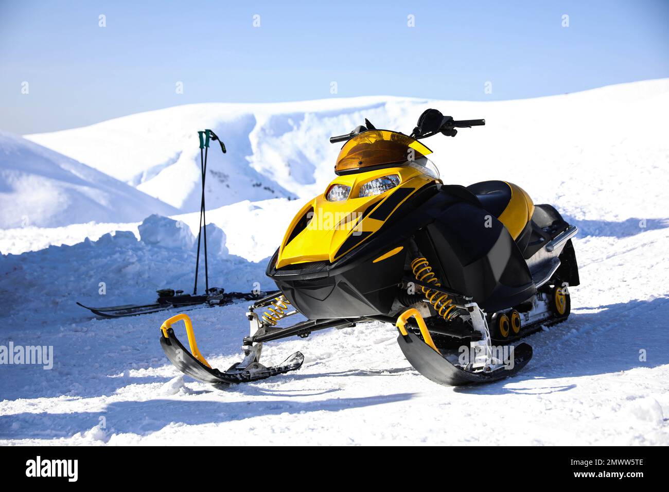 Modern snowmobile at ski resort. Winter vacation Stock Photo - Alamy